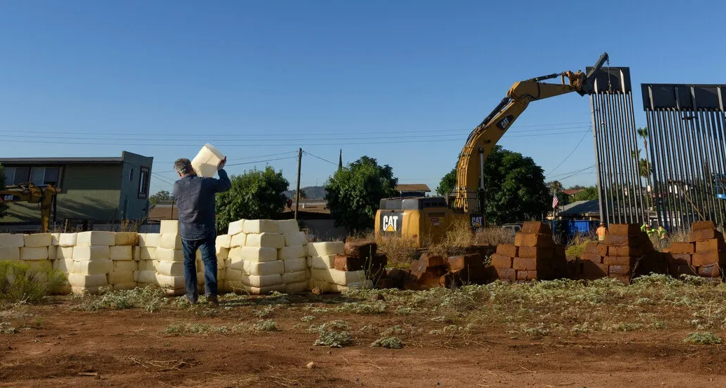 Artist sues after contractors demolish his wall of cheese on Mexican ...
