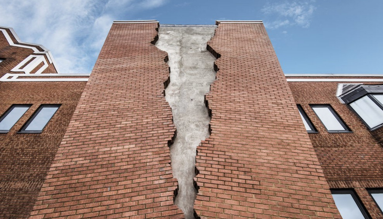 Artist designs giant crack to make wall of London building "more fun ...