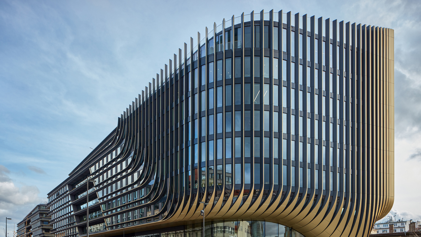ZHA’s finned Masaryčka building opens in Prague - Global Construction ... ZHA’s finned Masaryčka building opens in Prague - Global Construction ...